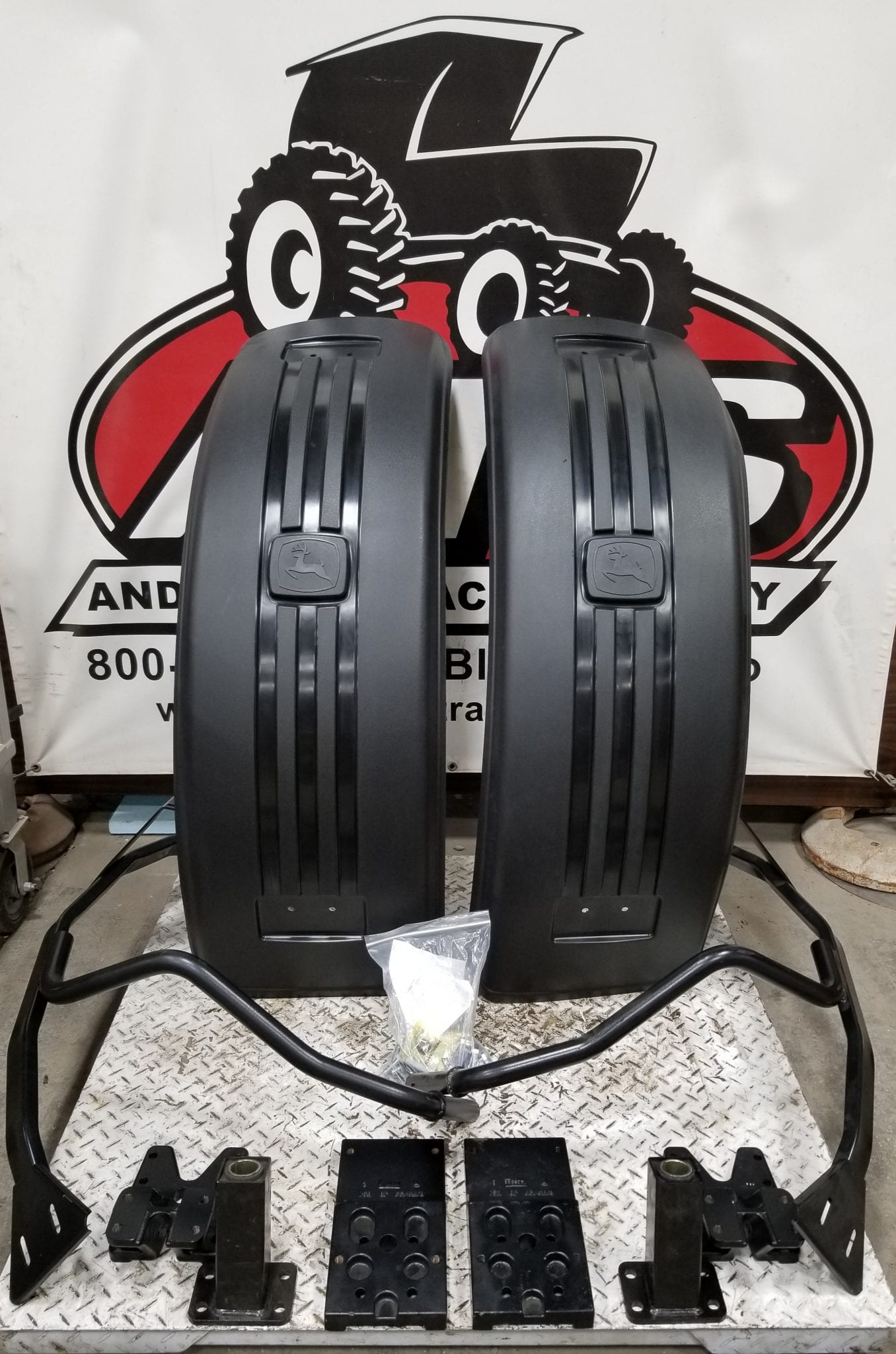 New JOHN DEERE MFWD FENDER KIT (NARROW) - RE211530 - Anderson Tractor Inc.